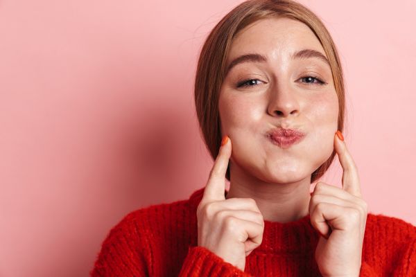 Cheek Piercing Guide: Pain, Healing, Risks & Aftercare